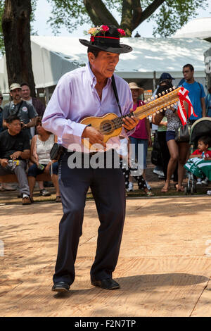 Peruvian man playing a charango Stock Photo - Alamy