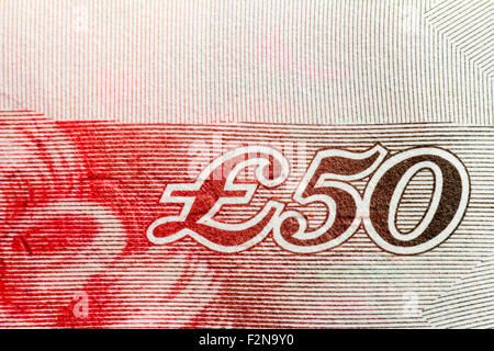 Close up of part of British sterling fifty pound note, showing the ...