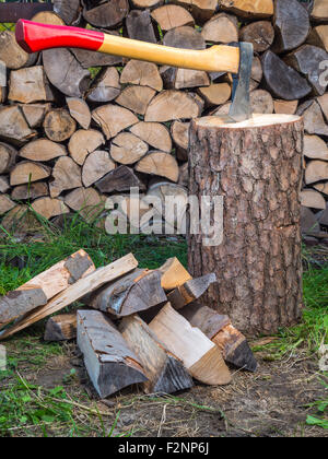 wood chopping block with logs Stock Photo - Alamy