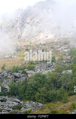 Panoramic view of mountains near Laparan lake in a foggy day. French ...