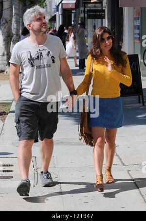 Max Joseph and his wife Priscila stroll hand in hand along Robertson ...