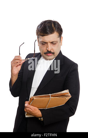 Lawyer working on case files at modern office desk professional ...