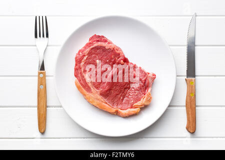 Fresh raw beef meat fillet shish kebab on skewers.Kiwi soaked meat.Long ...