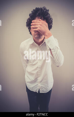 Man palming his head Stock Photo - Alamy