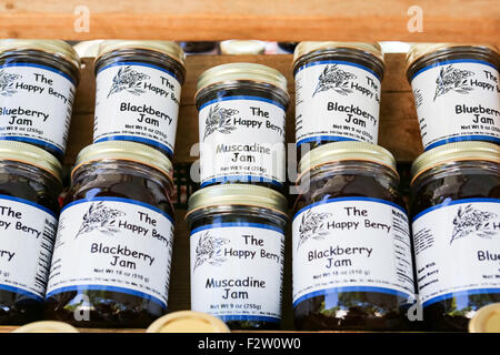 Homemade jams on a farmers market stall for sale at the Malvern autumn ...
