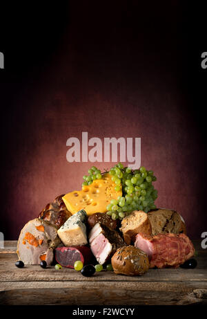 Delicious food on the wooden table Stock Photo - Alamy