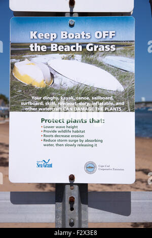 Sign saying to keep boats off of beach grass in order to protect ...