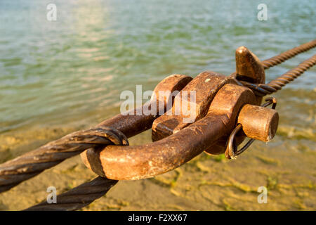 steel wire rope full of greasy dirt and connection fasteners Stock ...