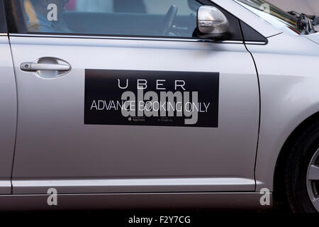 The logo on the side of an Uber taxi seen in Manchester city centre ...