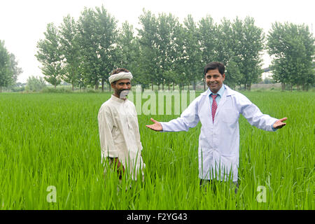 2 indian Doctor and rural farmer Farm Mobile Phone Quality showing ...