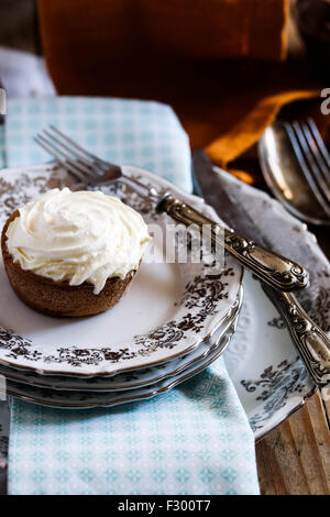 Autumn harvest. Cut pumpkin, grapes, carrots, viburnum lie on the ...
