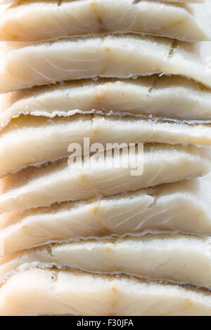 Stack of dried Salt Cod fish on a market stall fishmongers in Barcelona ...