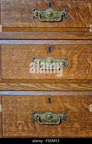 Close up of antique drawer handles Stock Photo - Alamy