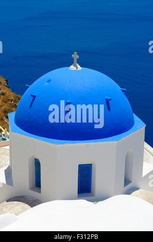 Iconic Blue and White Domed Church and Garden in Santorini Stock Photo ...