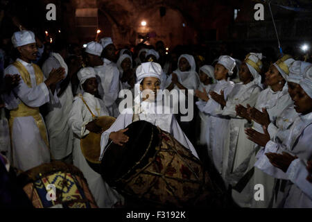Ethiopian Orthodox Christian pilgrims play the Kebero a double-headed ...