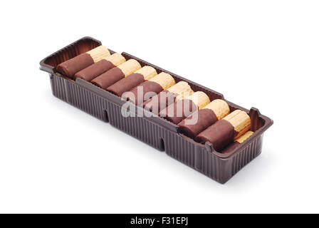 Chocolate wafer rolls on a white background Stock Photo - Alamy