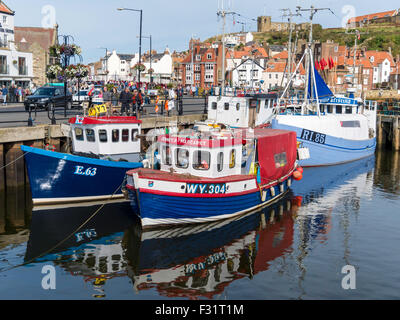 Fishing boats at New Quay Wharf in Whitby harbour North Yorkshire UK ...