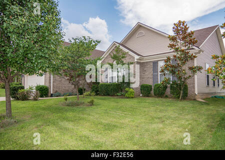 American middle class suburban house with sunroom Stock Photo - Alamy