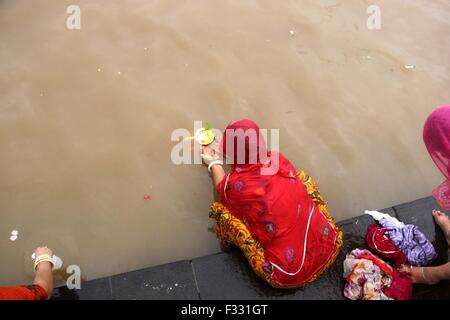 Nashik, India. 25th Sep, 2015. Hindu devotees doing ritual during the ...