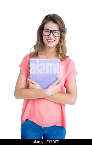 Composite image of pretty geeky hipster smiling at camera Stock Photo ...