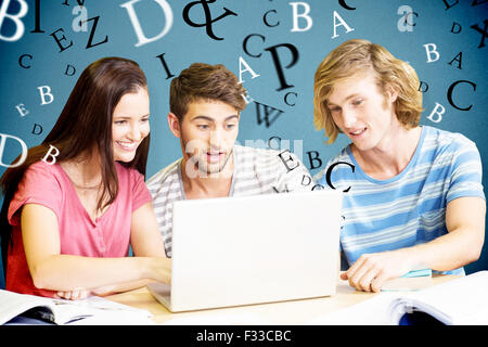 Composite image of college students using laptop in library Stock Photo ...