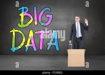 Composite image of nerdy businessman in a box Stock Photo - Alamy