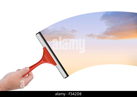 Composite image of hand using wiper Stock Photo - Alamy