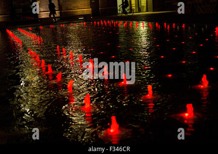 Colourful fountains behind Kings Cross station on Granary Square Stock ...