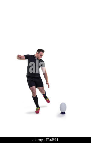 rugby player with ball kicking ball Stock Photo - Alamy