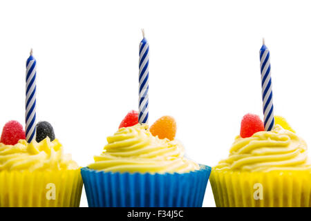 Delicious birthday cupcakes on table on bright background Stock Photo ...
