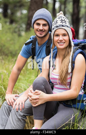 Portrait of a young smiling hiker couple Stock Photo - Alamy