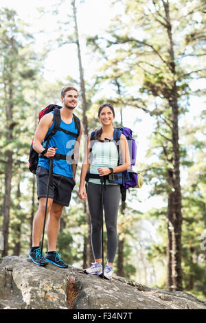 Happy joggers in forest Stock Photo - Alamy