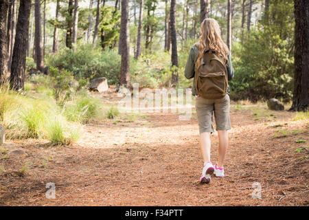 Blonde hiker hiking on path Stock Photo - Alamy