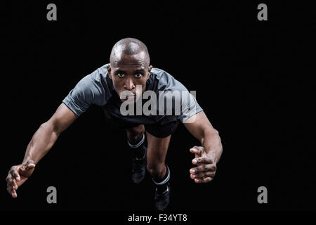 Portrait of rugby player jumping Stock Photo - Alamy
