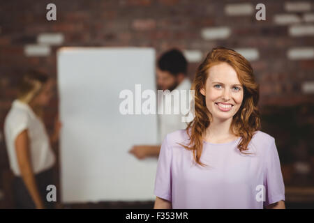 Portrait of a joyful young man and woman in white t-shirts sharing a ...