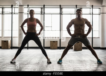 Two fit people doing fitness Stock Photo - Alamy