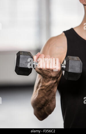 cropped image of man standing in brown shirt isolated on blue Stock ...