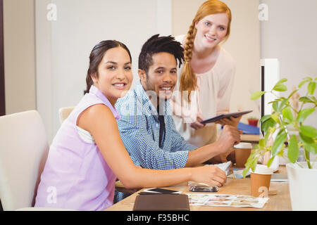 Business people working together on project and brainstorming in office ...