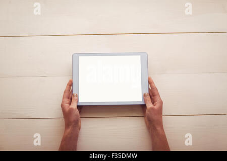 Female hands holding tablet with blank screen isolated Stock Photo - Alamy