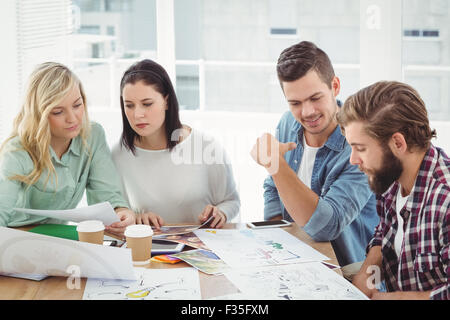 Creative business people working on business project in office Stock ...