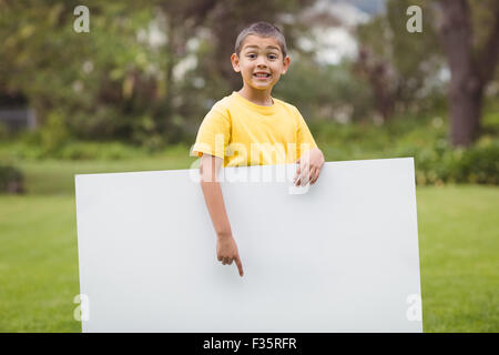 Cute pupils showing large poster Stock Photo - Alamy