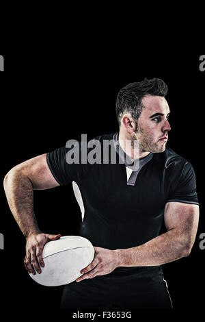 Composite image of rugby player throwing ball Stock Photo - Alamy