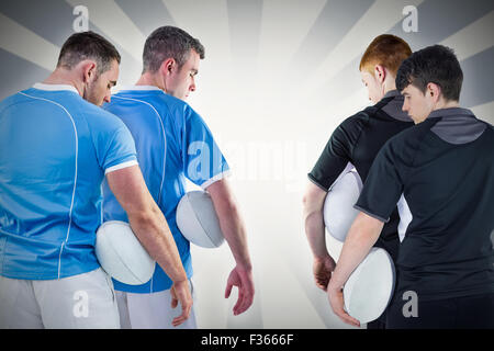 Composite image of tough rugby players Stock Photo - Alamy