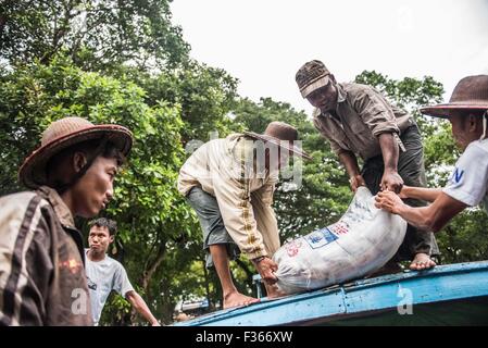 Humanitarian aid supplies are delivered by an NGO to flood hit ...