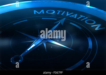 Composite image of compass pointing to motivation Stock Photo - Alamy
