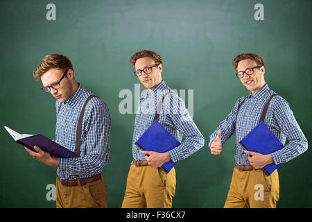 Composite image of nerd with notebook Stock Photo - Alamy