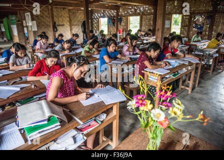 Schoolgirls study at a school in Kachin State, Myanmar Stock Photo - Alamy