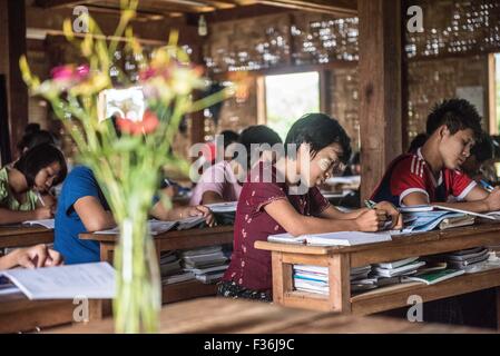 Schoolgirls study at a school in Kachin State, Myanmar Stock Photo - Alamy