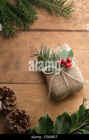Christmas tree of eco gift wrapped in red and grey textile. Sustainable ...