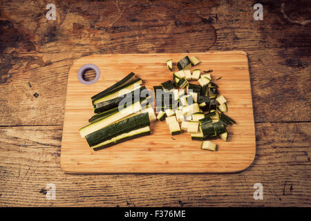 Chopped Courgette on Chopping Board Stock Photo - Alamy